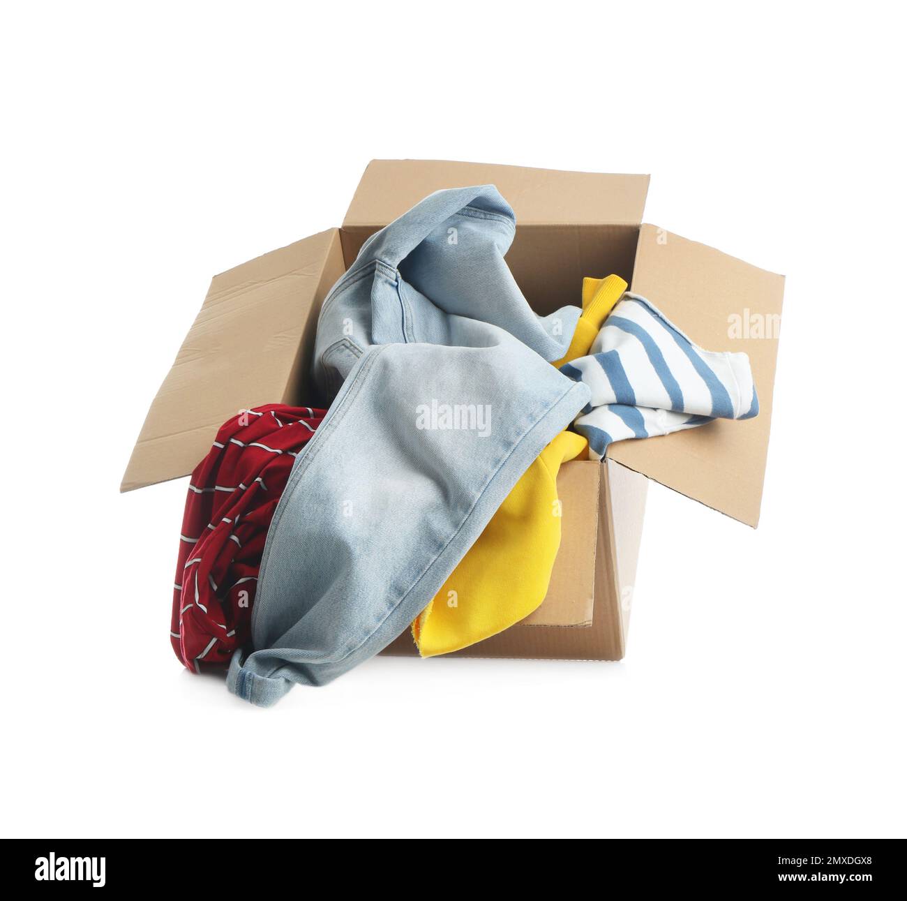 Cardboard box with clothes isolated on white Stock Photo - Alamy