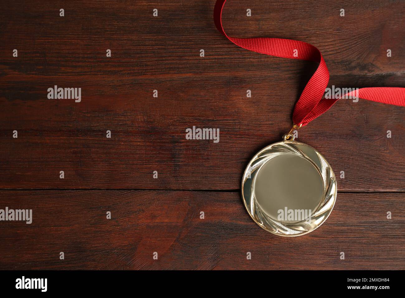 Gold medal on wooden background, top view. Space for design Stock Photo ...