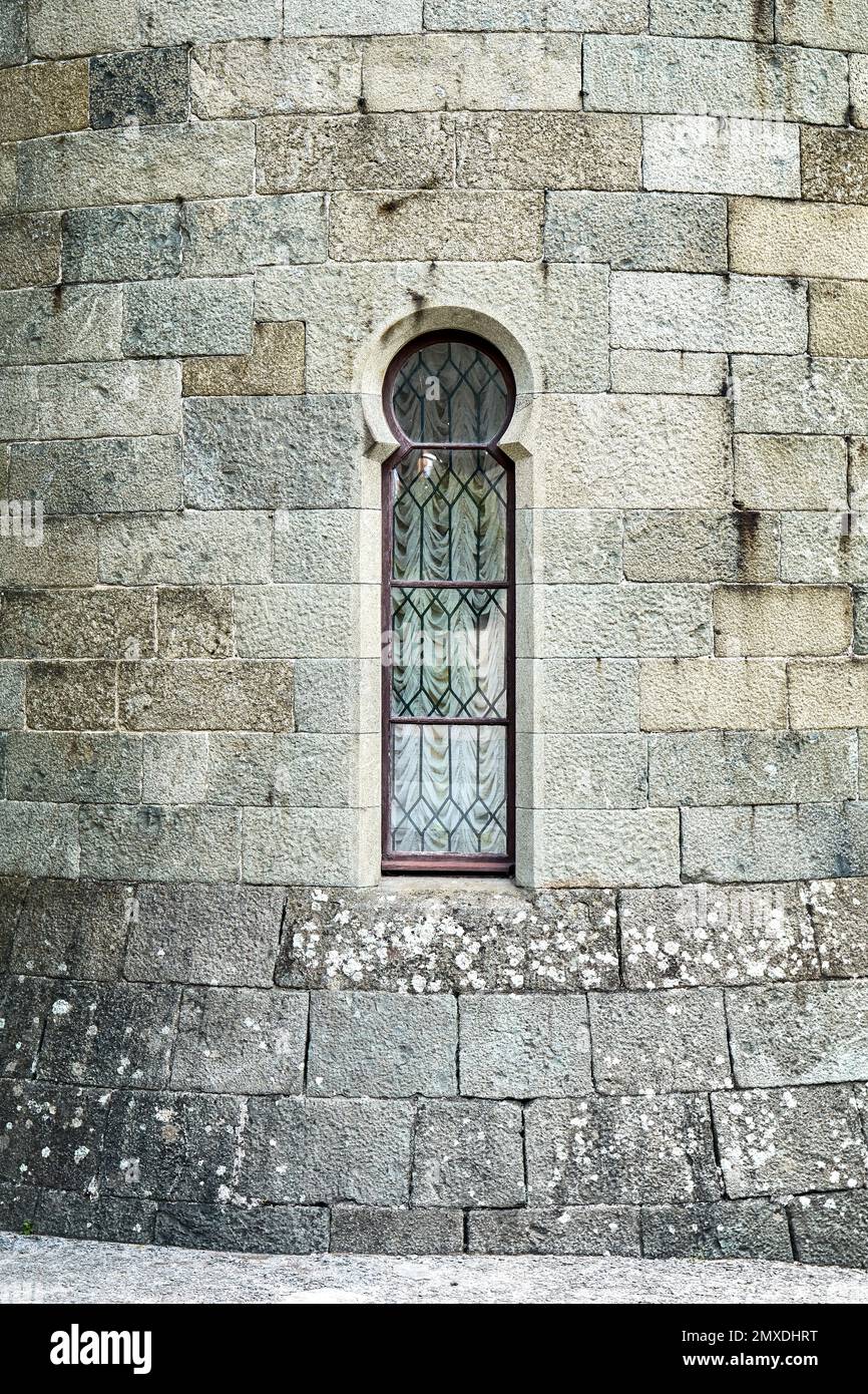 Old medieval window surrounded by stone wall in castle attracts ...