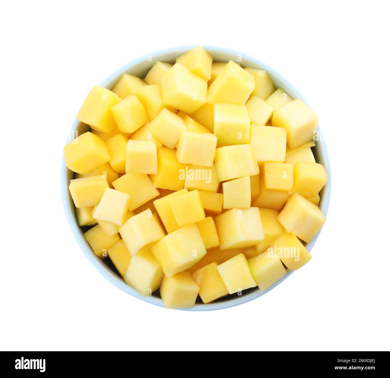 Tasty mango cubes in ceramic bowl isolated on white, top view Stock ...