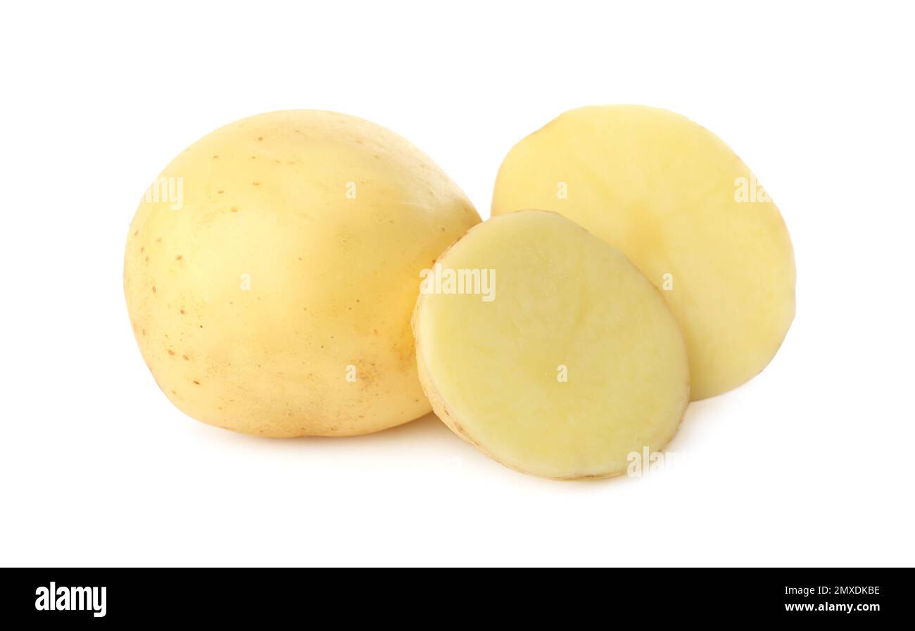 Whole and cut fresh raw organic potatoes on white background Stock ...