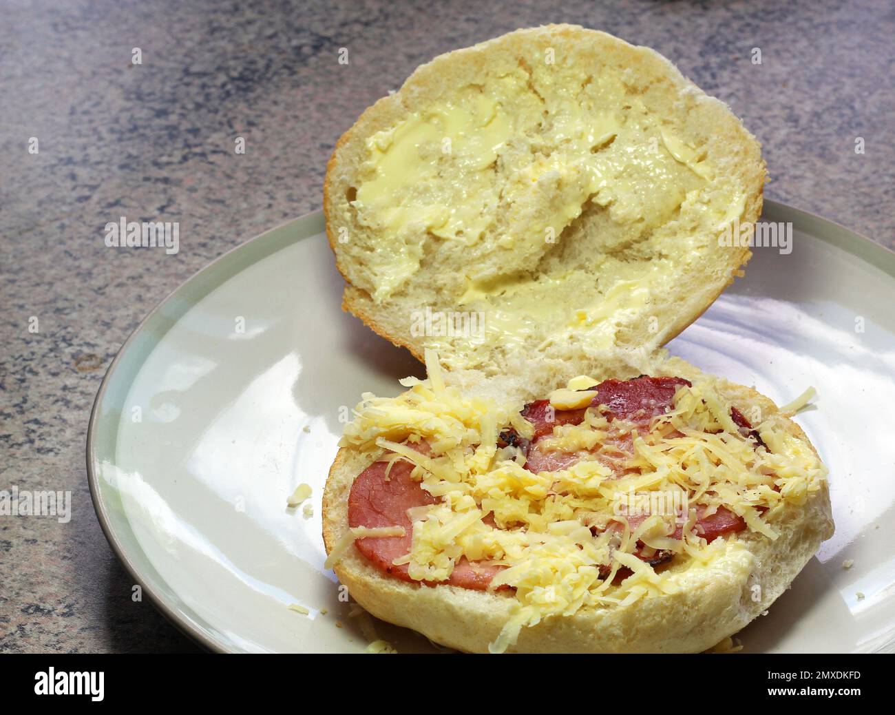 Bacon and cheese roll or bread bun Stock Photo - Alamy