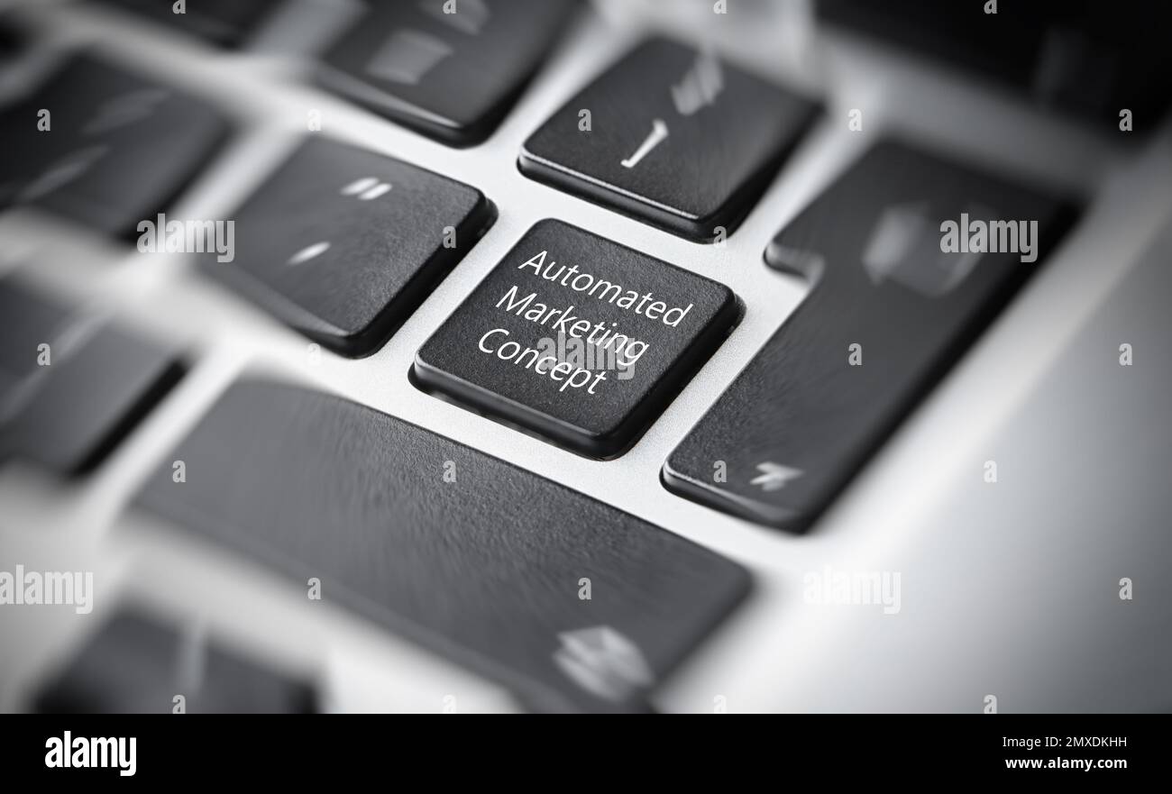 Modern laptop keyboard with text AUTOMATED MARKETING CONCEPT on button ...