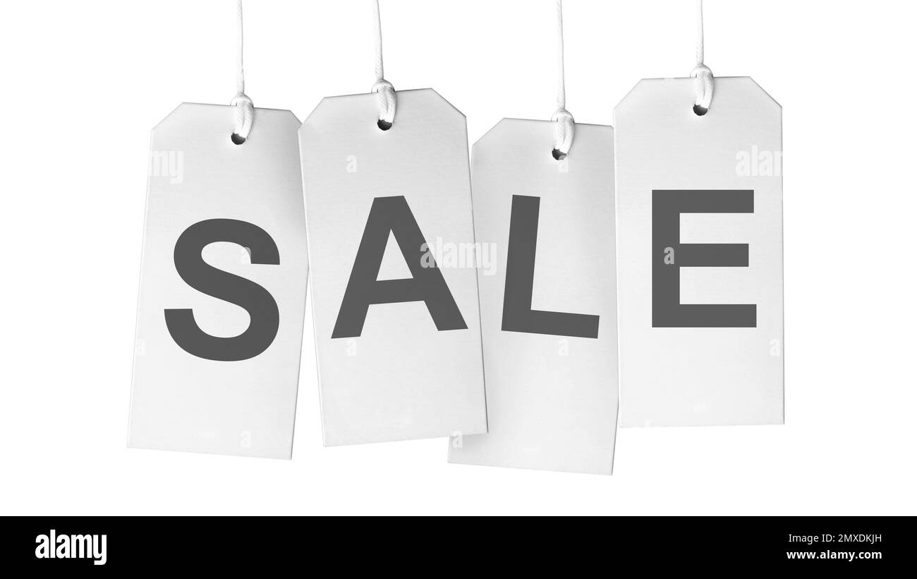 Cardboard tags with word SALE on white background Stock Photo - Alamy