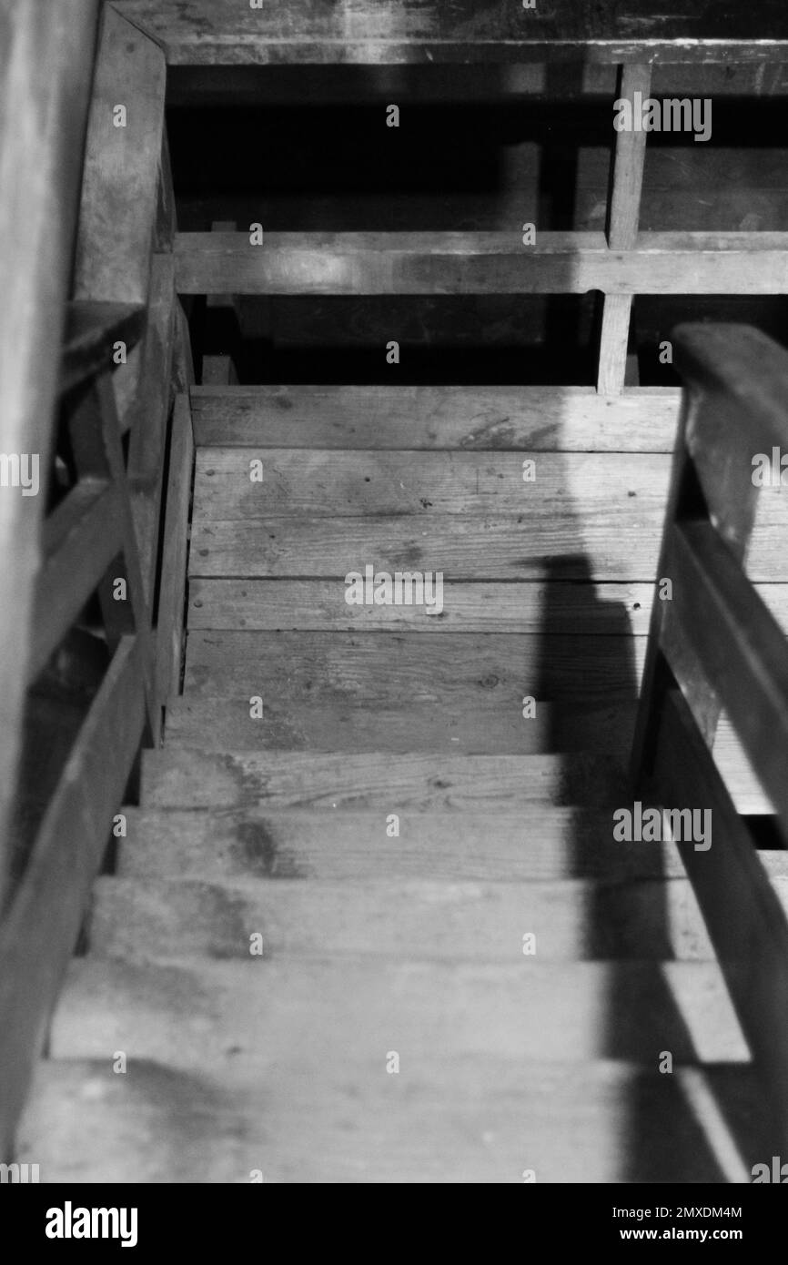 Typical common wooden scaffolding stairs going down to the next level ...