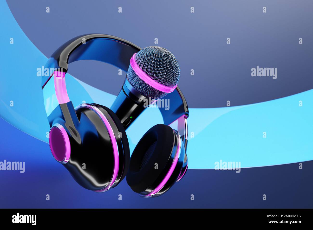 microphone, round shape model and wireless headphones on blue ...