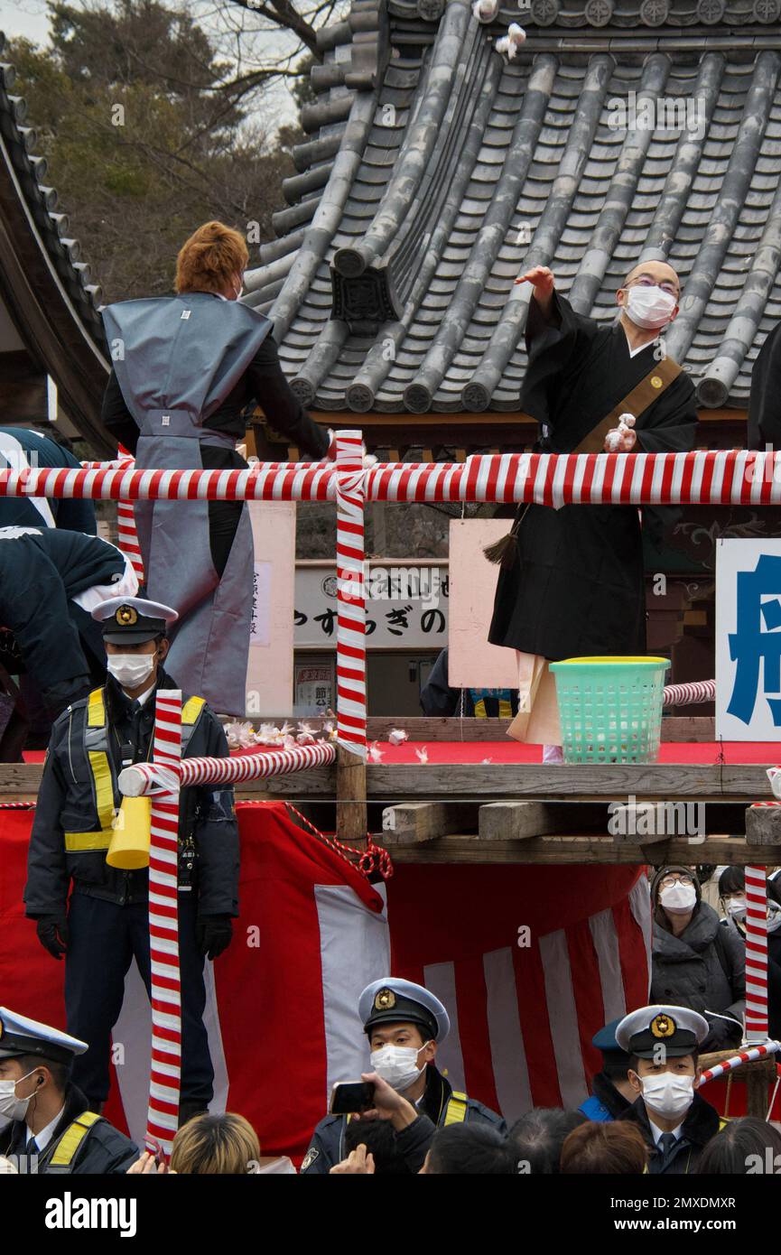 Tokyo, Japan. 03rd Feb, 2023. Buddhist monk throws beans during the ...