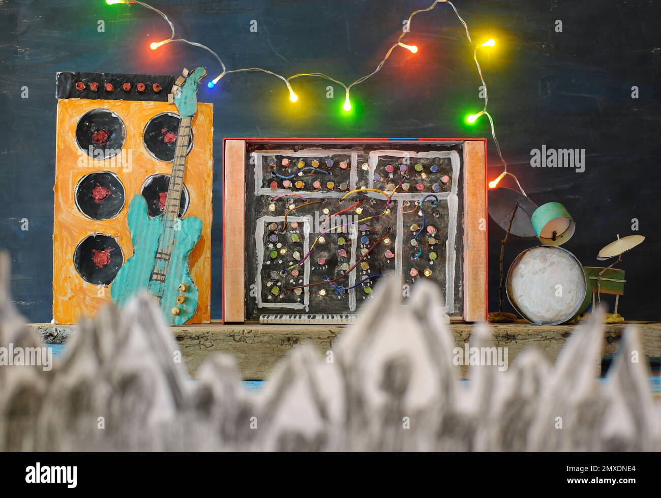 Grungy cardboard models of synthesizer,drum kit,guitar,amplifier on ...