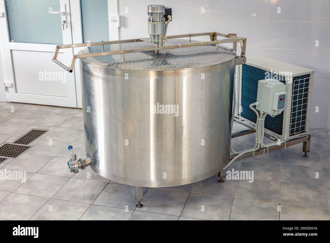 A small family cheese factory in the Carpathian village. Device for ...