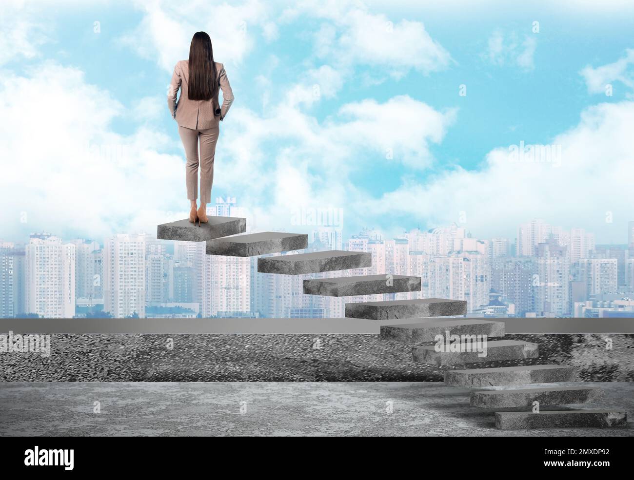 Woman standing on step ladder hi-res stock photography and images - Alamy