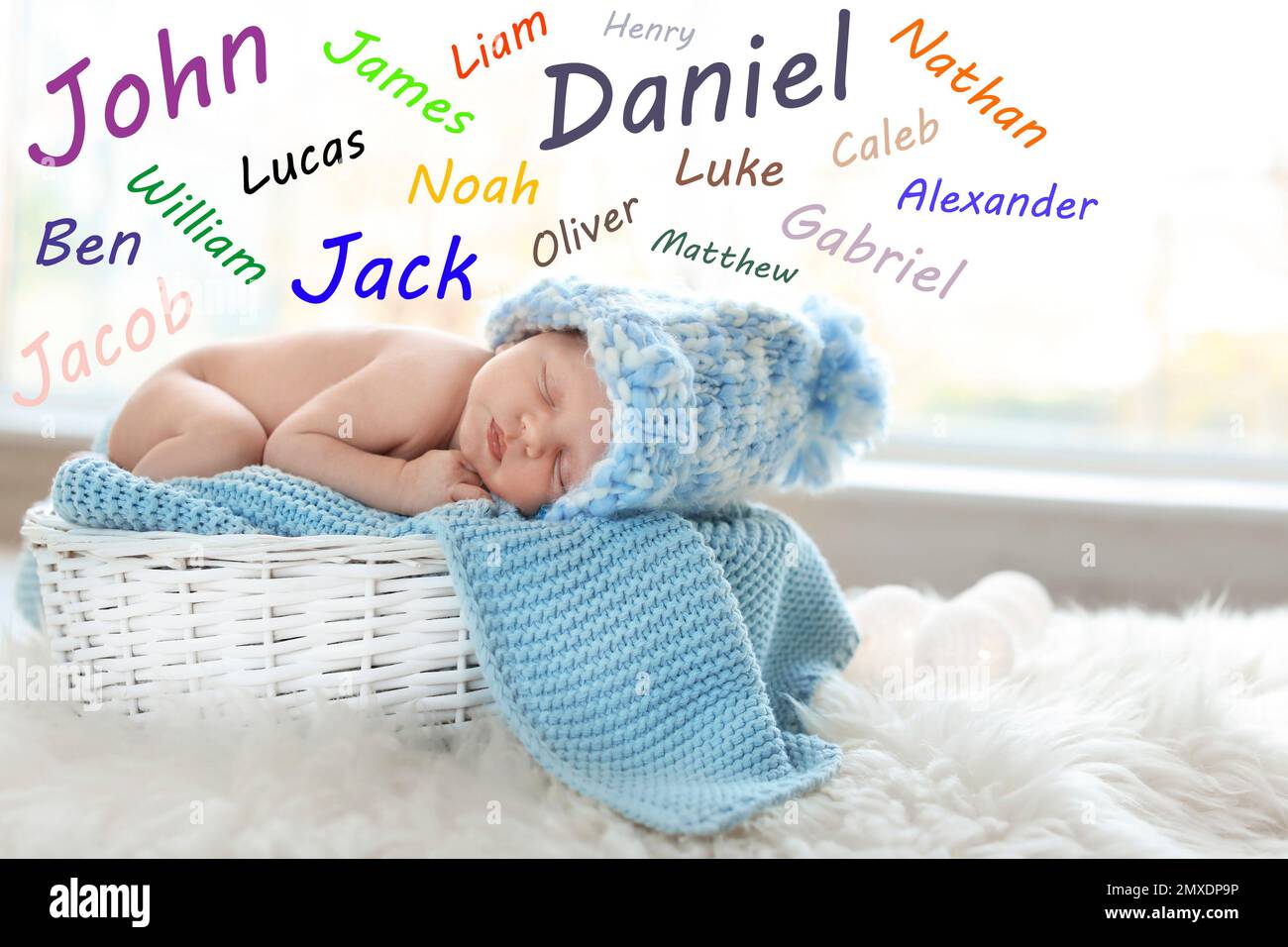 Choosing name for baby boy. Adorable newborn sleeping Stock Photo - Alamy
