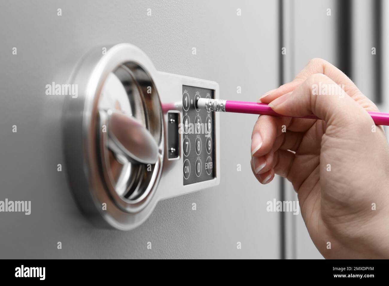 Woman using pencil hi-res stock photography and images - Alamy