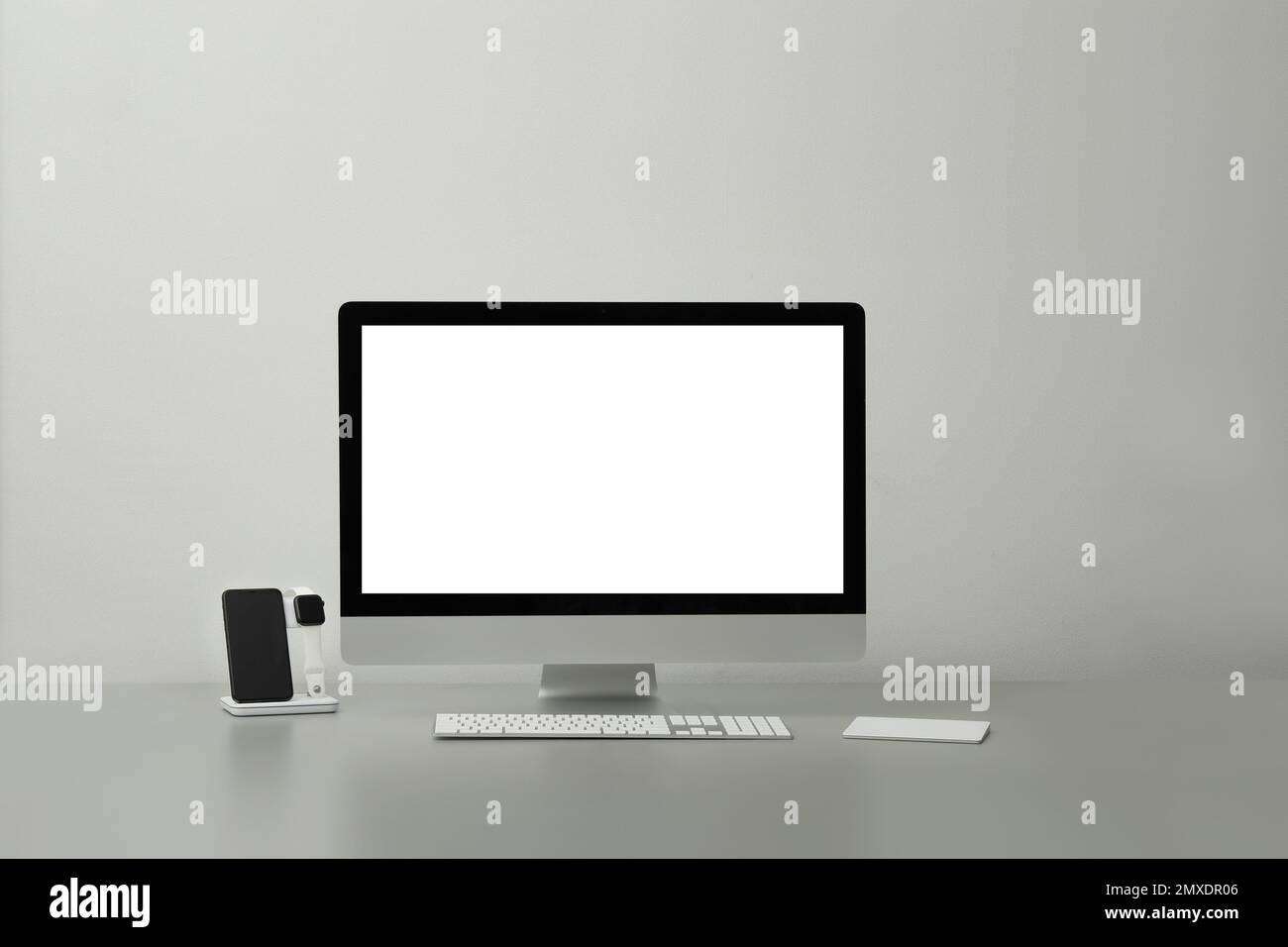 Modern workplace with computer and charging devices. Interior design ...