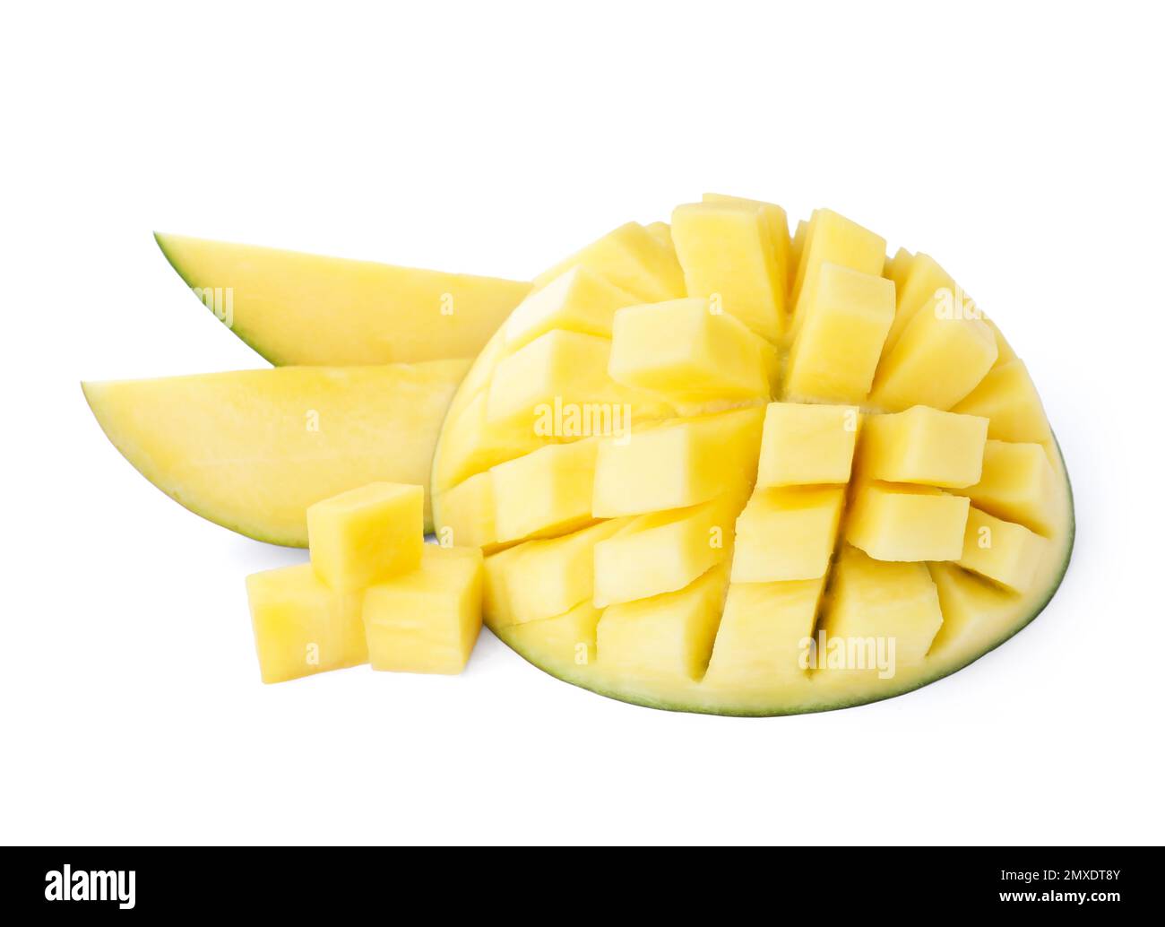 Delicious ripe mango cut into cubes and slices isolated on white Stock ...