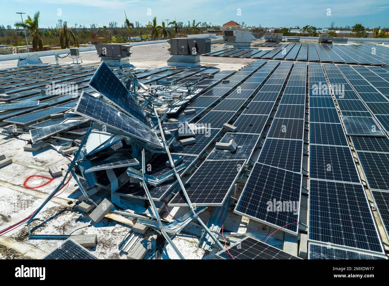 Aerial view of damaged by hurricane wind photovoltaic solar panels ...