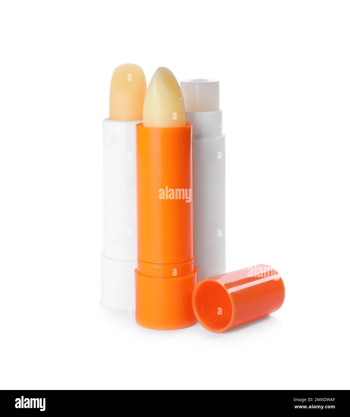 Sun protection lip balms on white background Stock Photo - Alamy