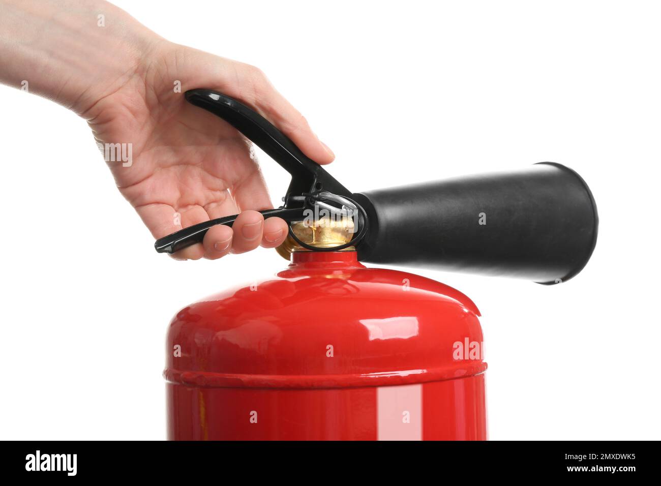 Woman using fire extinguisher on white background, closeup Stock Photo ...