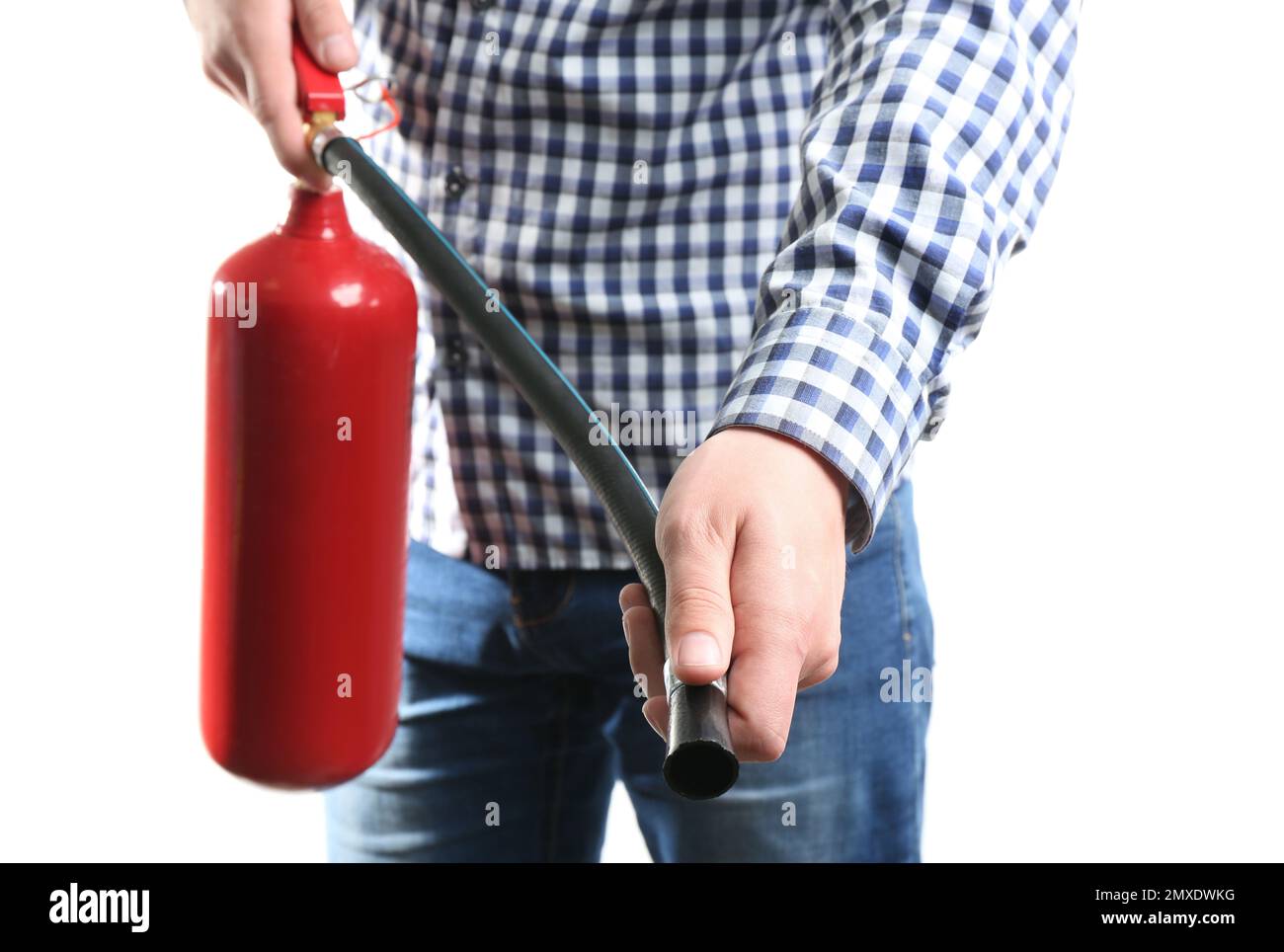 Man using fire extinguisher on white background, closeup Stock Photo ...