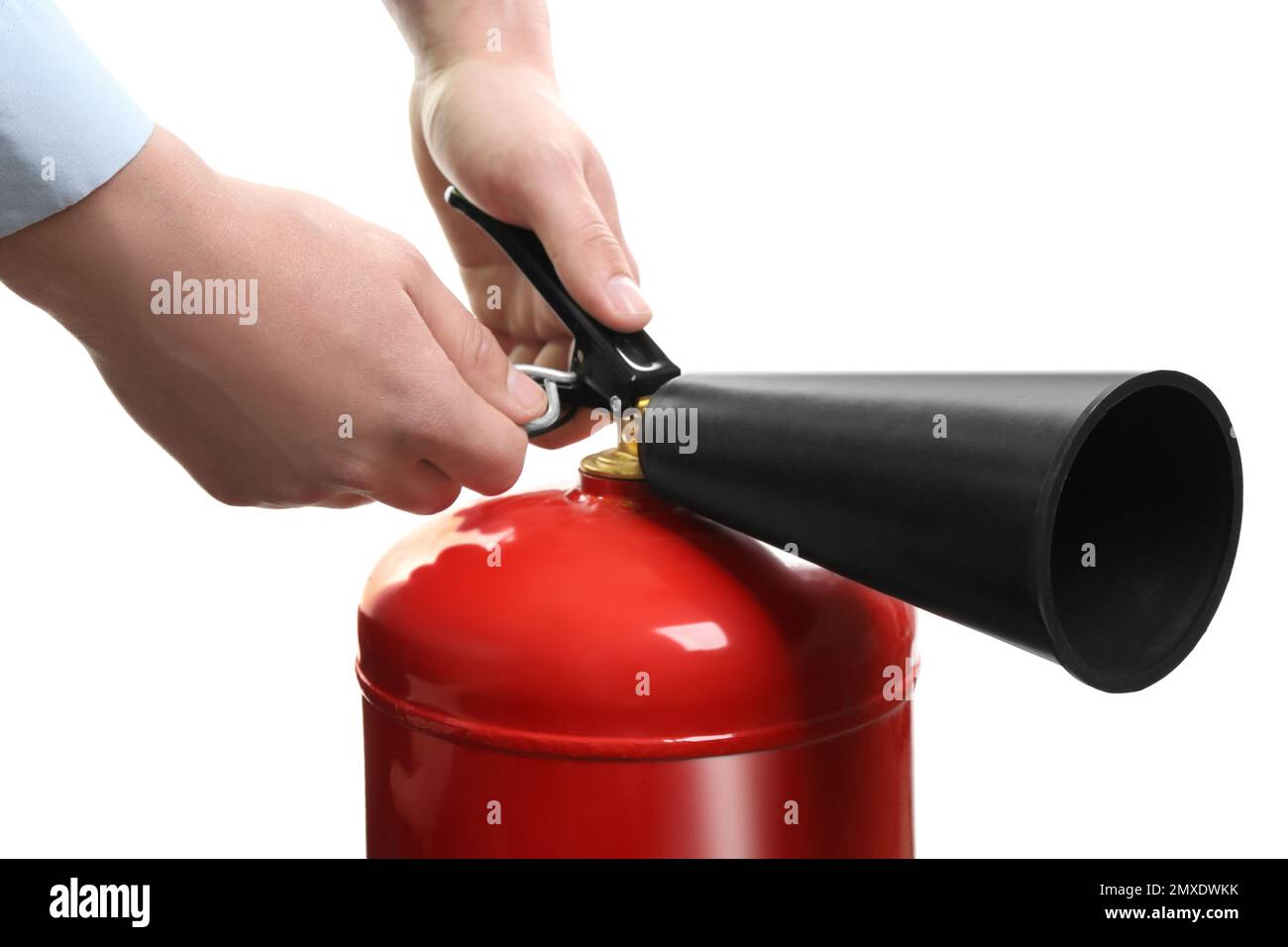 Man using fire extinguisher on white background, closeup Stock Photo ...