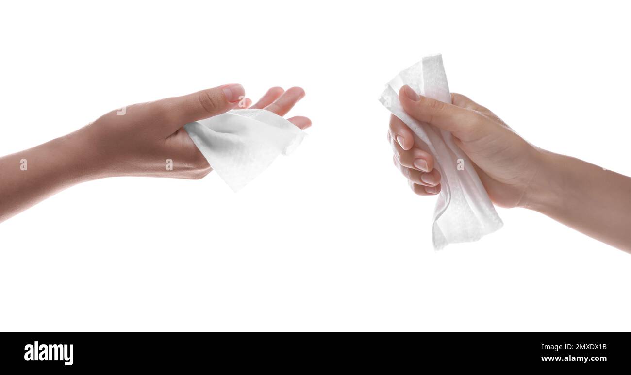 Closeup view of people holding wet wipes on white background Stock ...
