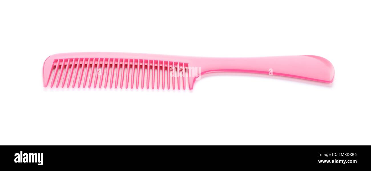 New pink hair comb isolated on white Stock Photo - Alamy