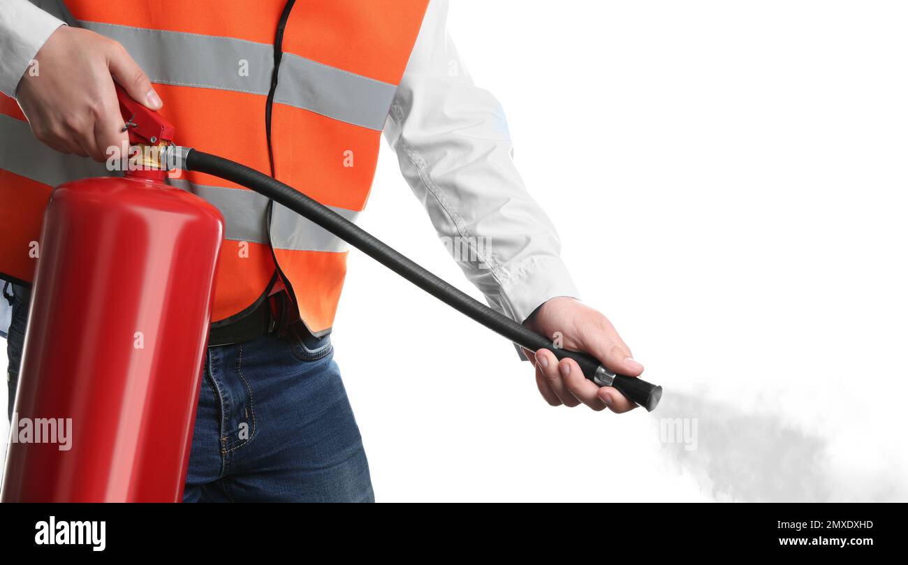 Worker using fire extinguisher on white background, closeup Stock Photo ...