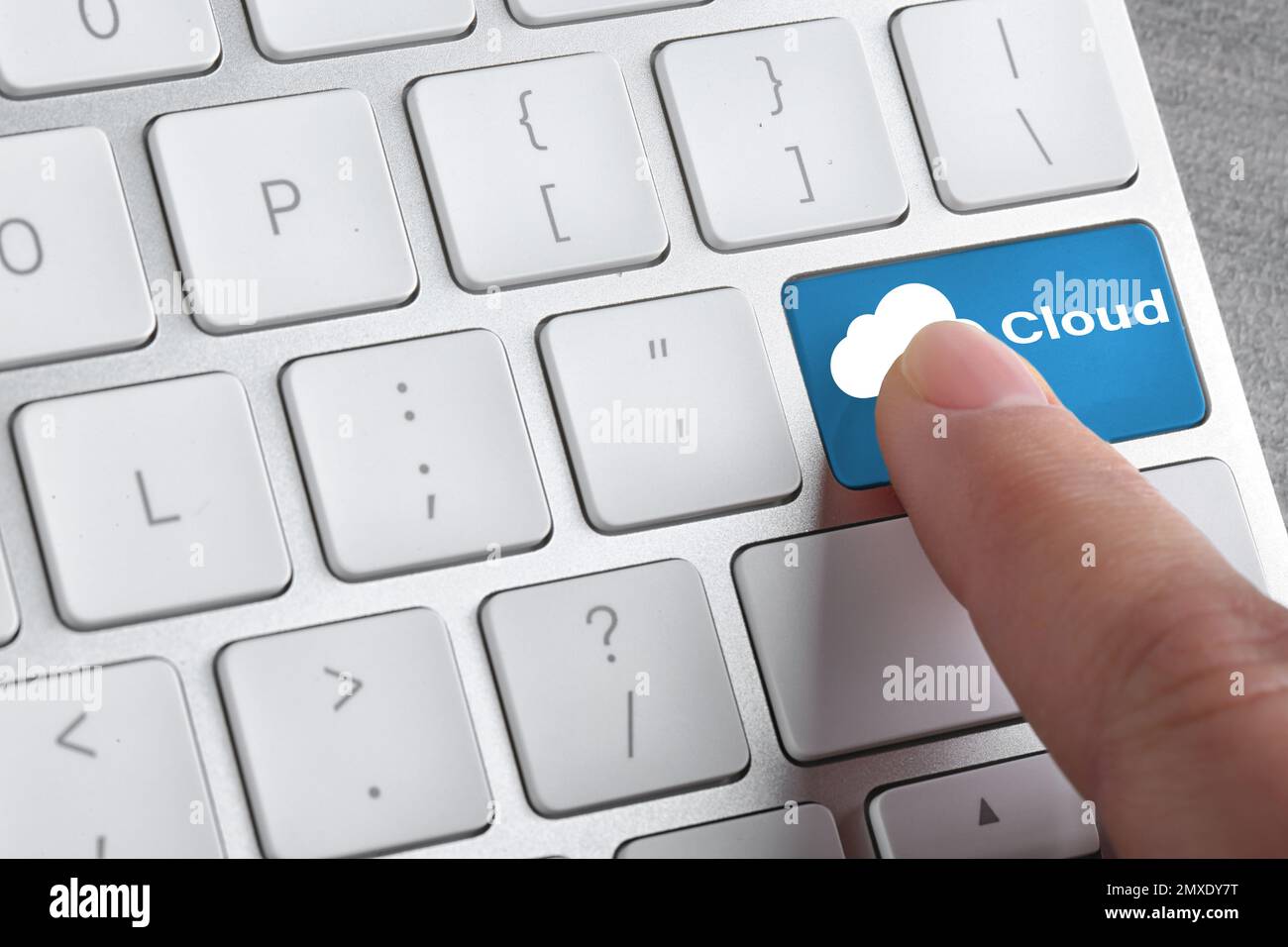 Cloud technology. Woman pressing button on computer keyboard, closeup ...