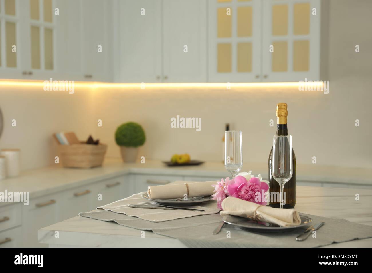 Beautiful table setting in modern kitchen. Interior design Stock Photo ...