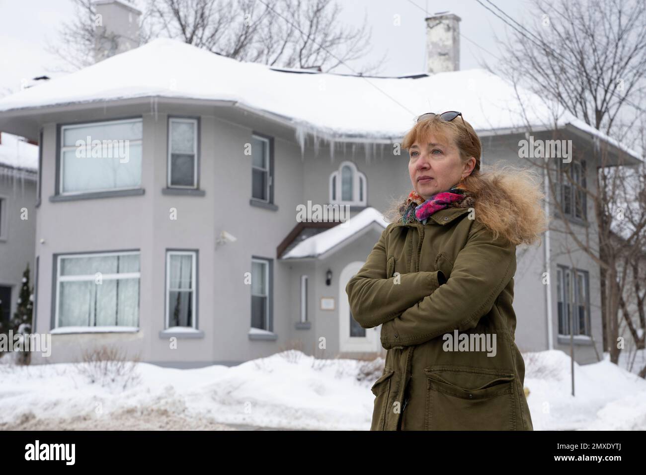 Elena Pushkareva poses for a photo in front of the Russian consular ...
