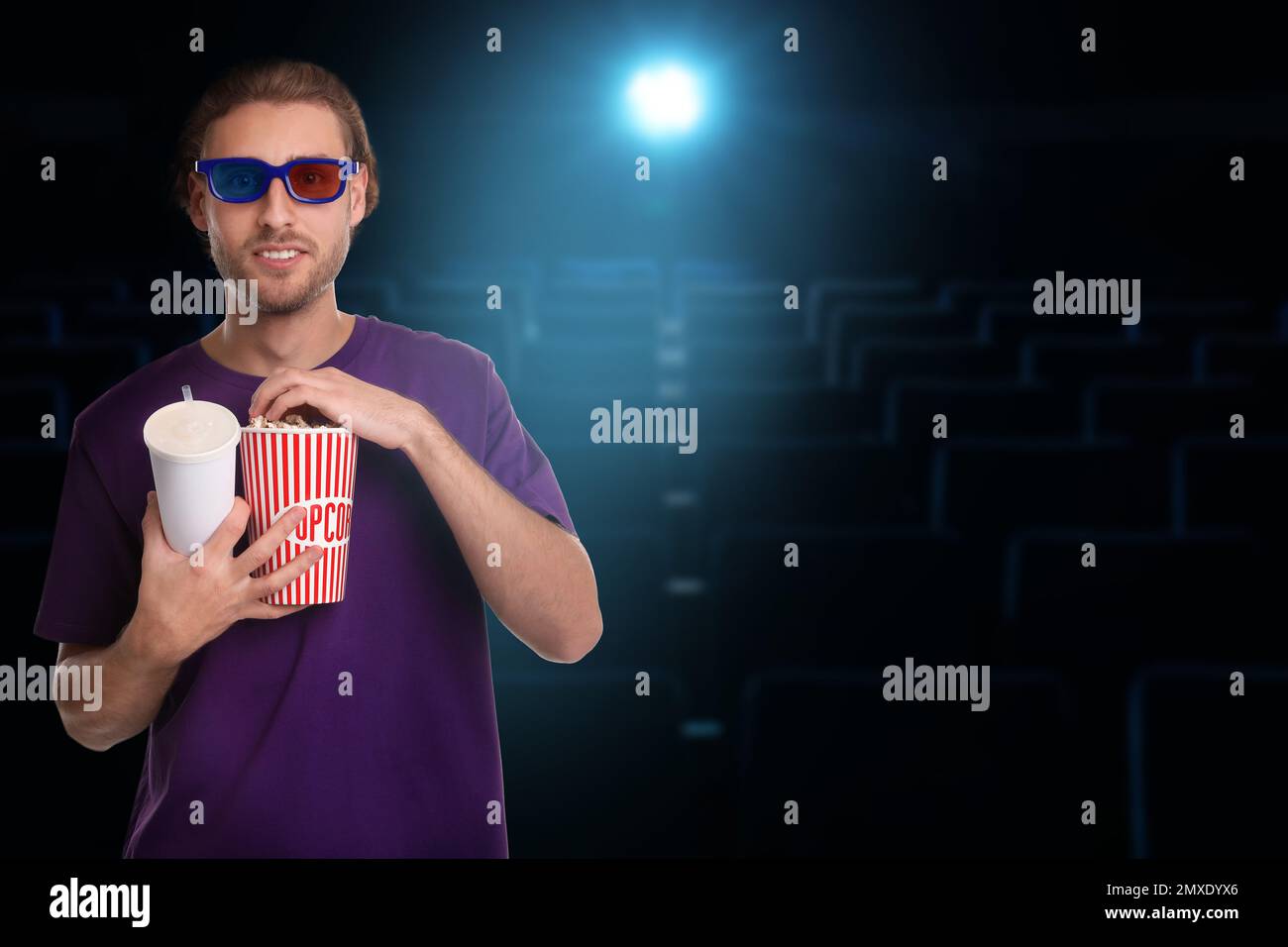 Man in cinema seat hi-res stock photography and images - Alamy