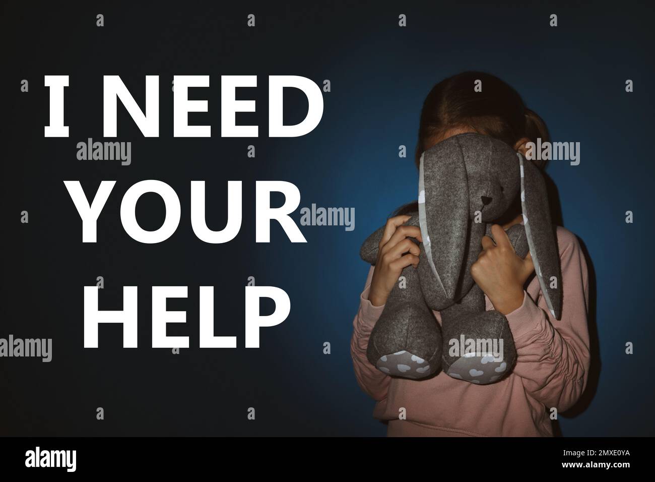 Scared little girl with bunny and text I NEED YOUR HELP on dark ...