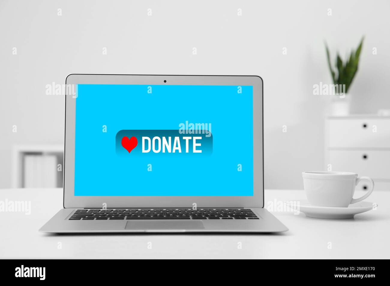 Donate your laptop hi-res stock photography and images - Alamy