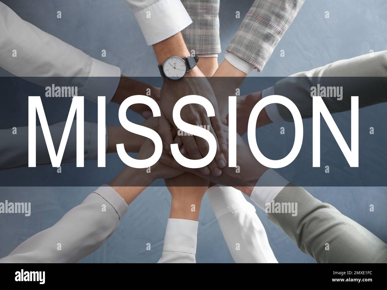 Team building mission hands hi-res stock photography and images - Alamy