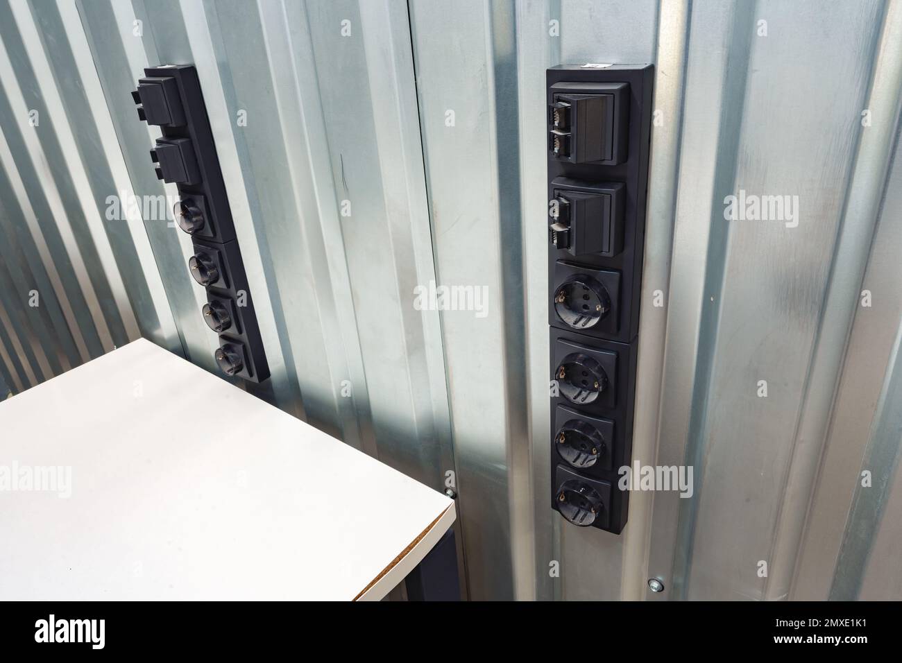 Black electrical outlet socket on a room wall Stock Photo - Alamy
