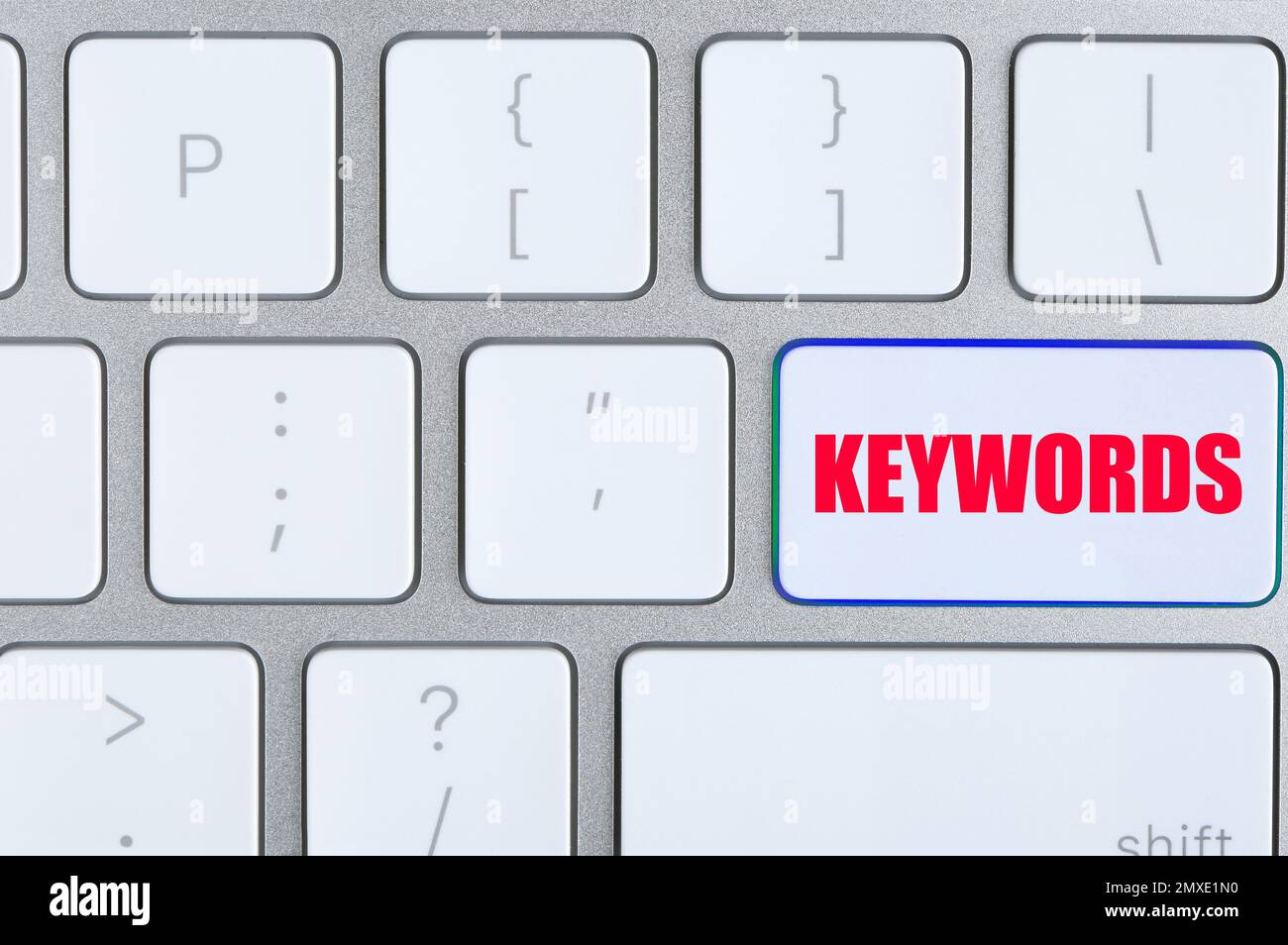 Keyboard with text KEYWORDS as background, top view Stock Photo - Alamy