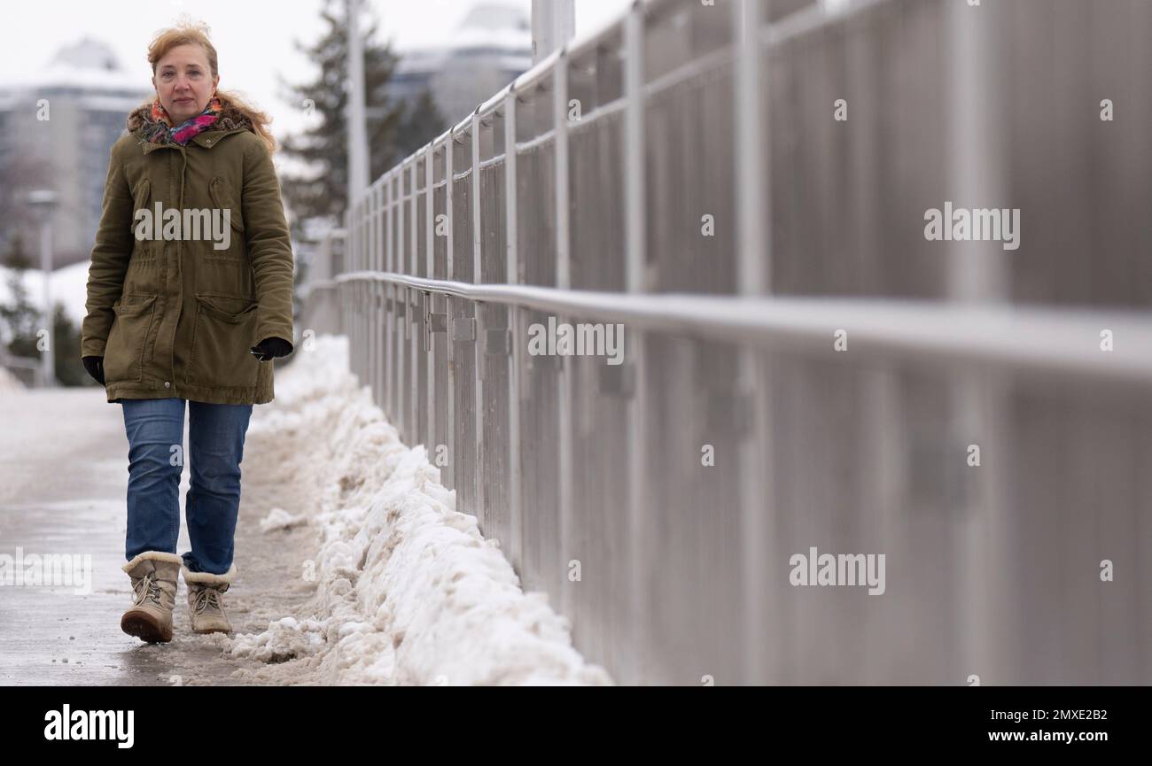 Elena Pushkareva poses for a photo in front of the Russian consular ...