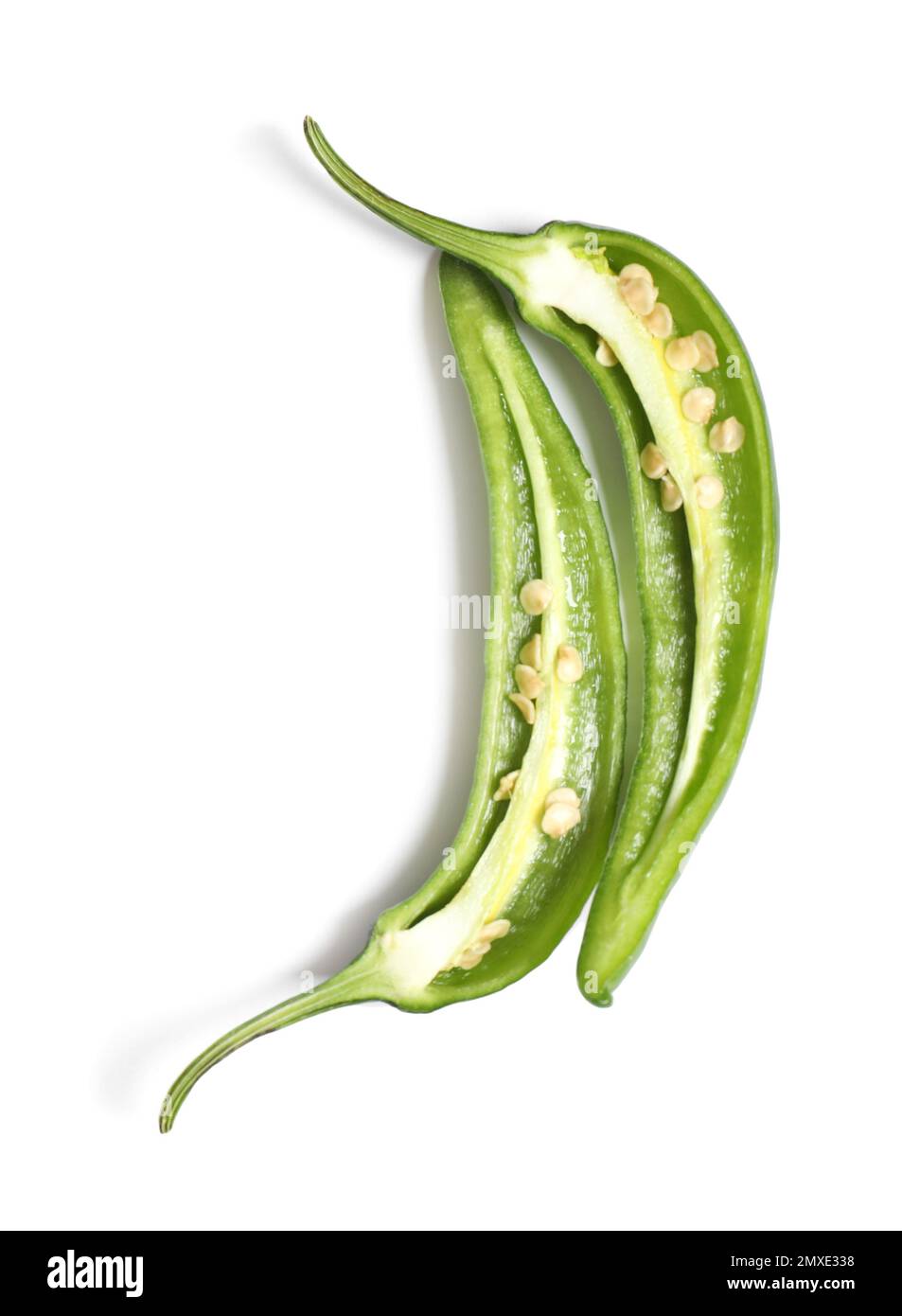 Cut green chili pepper on white background, top view Stock Photo - Alamy