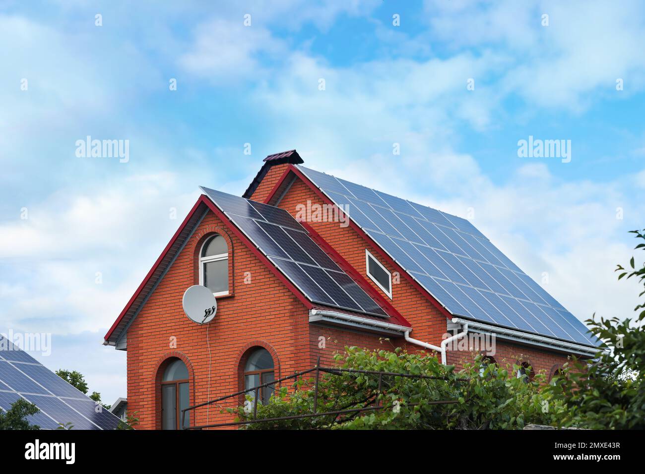 House with installed solar panels on roof Stock Photo - Alamy