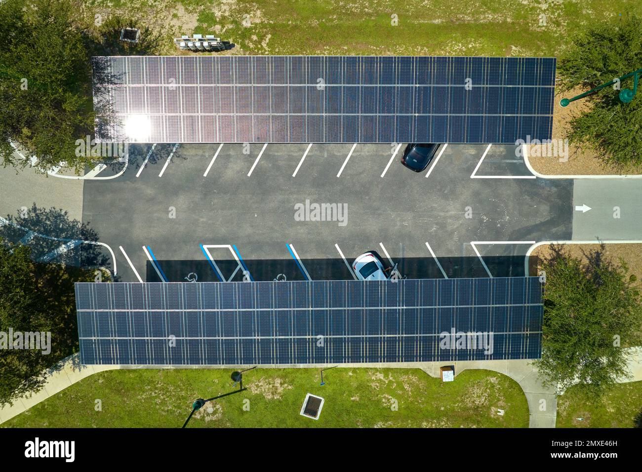 Aerial view of solar panels installed as shade roof over parking lot ...