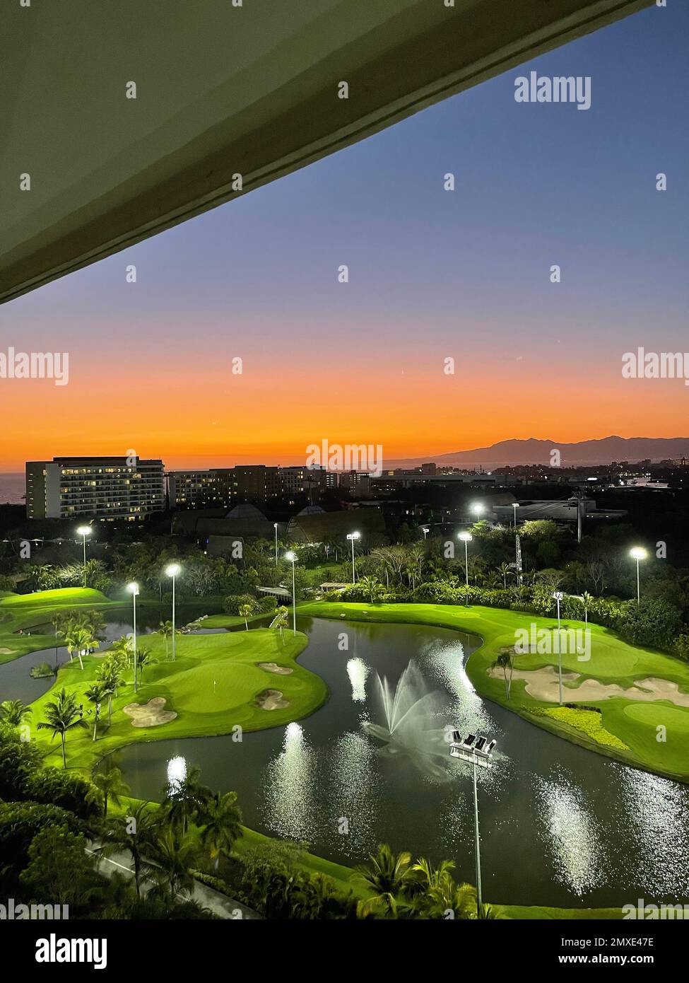 A beautiful view of golf courses with the background of a magnificent ...