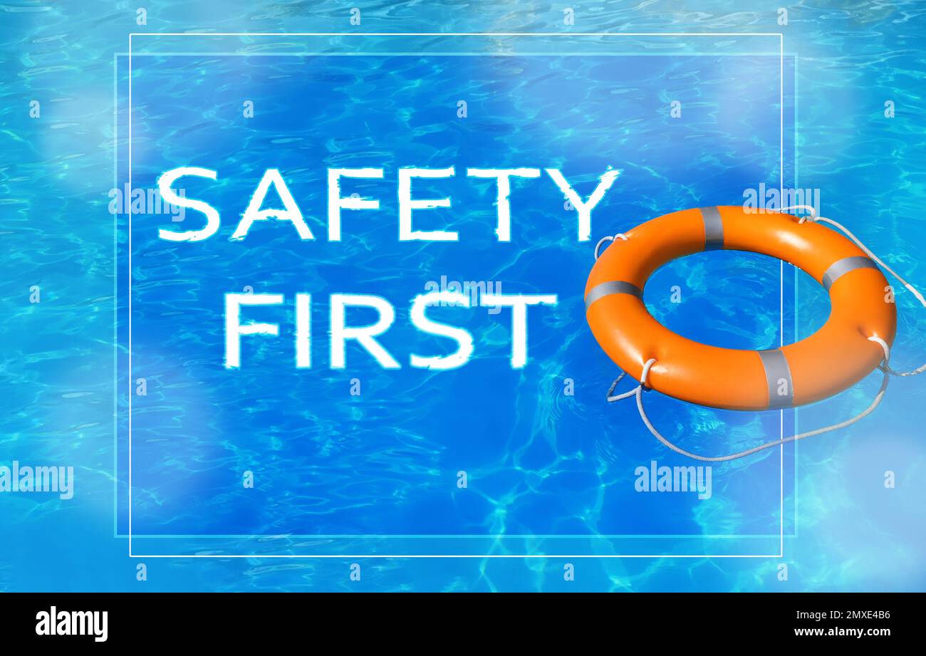 Safety first. Life buoy in swimming pool with clean blue water Stock ...