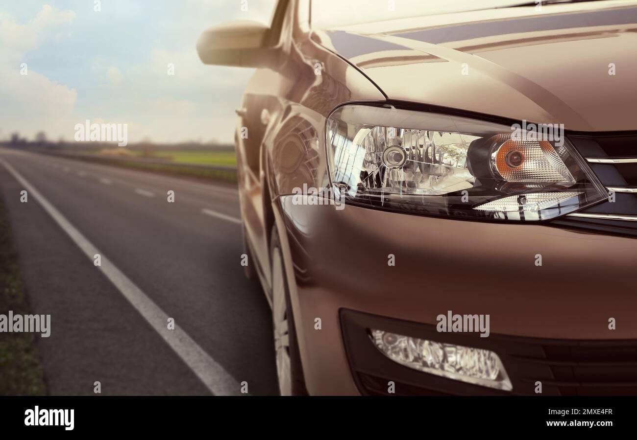 Road trip. Car driving on asphalt highway, closeup Stock Photo - Alamy