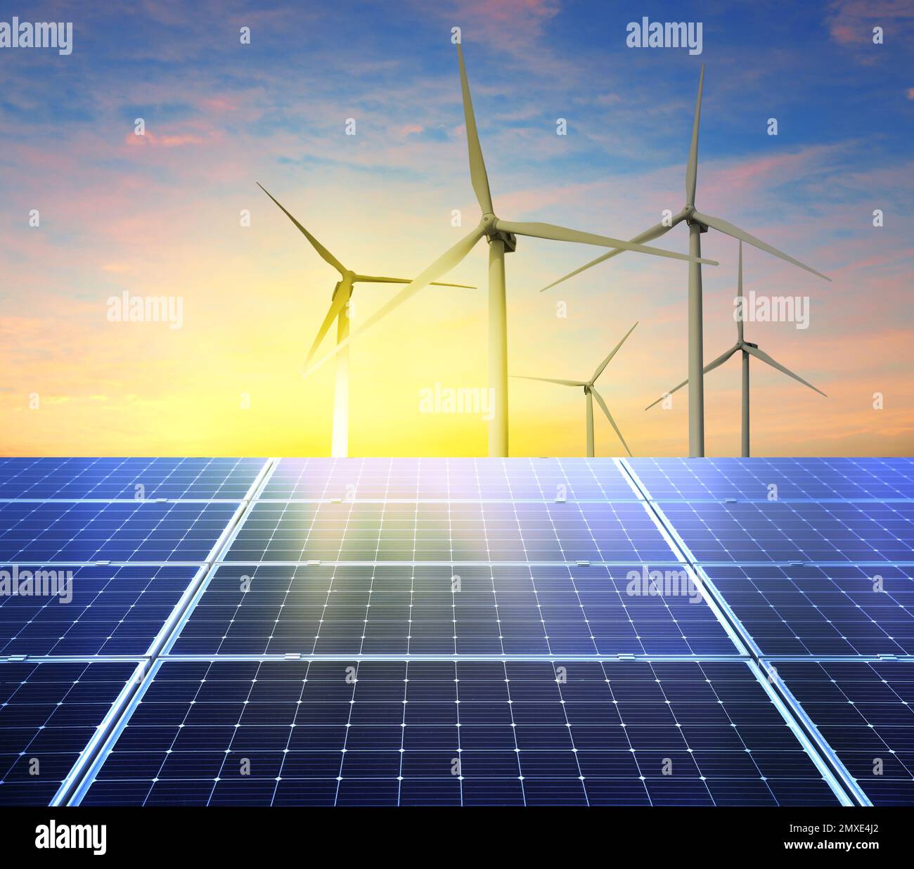 Solar panels and wind turbines installed outdoors. Alternative energy ...