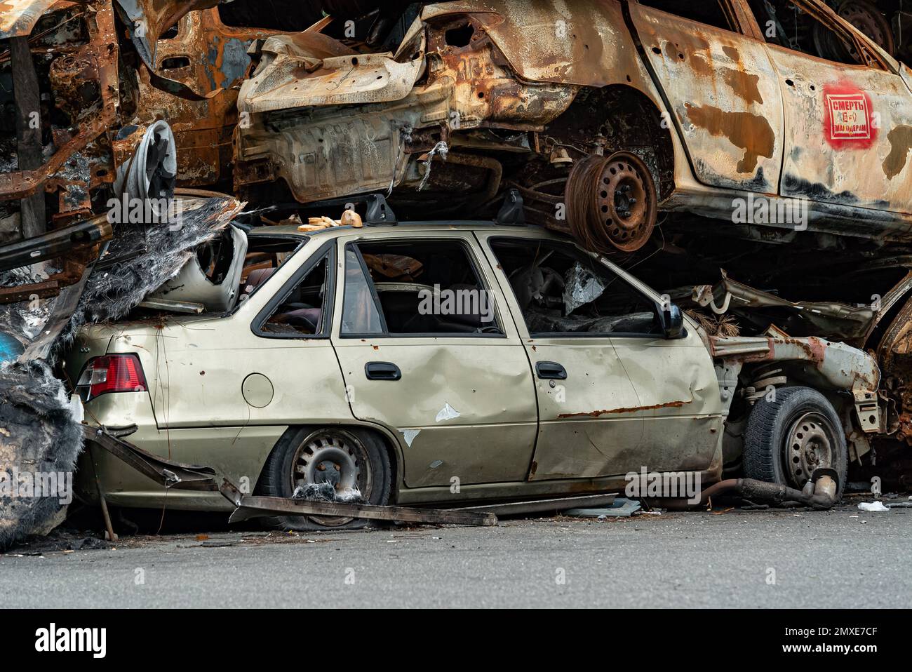 Shot and burned cars during the war in Ukraine Stock Photo - Alamy