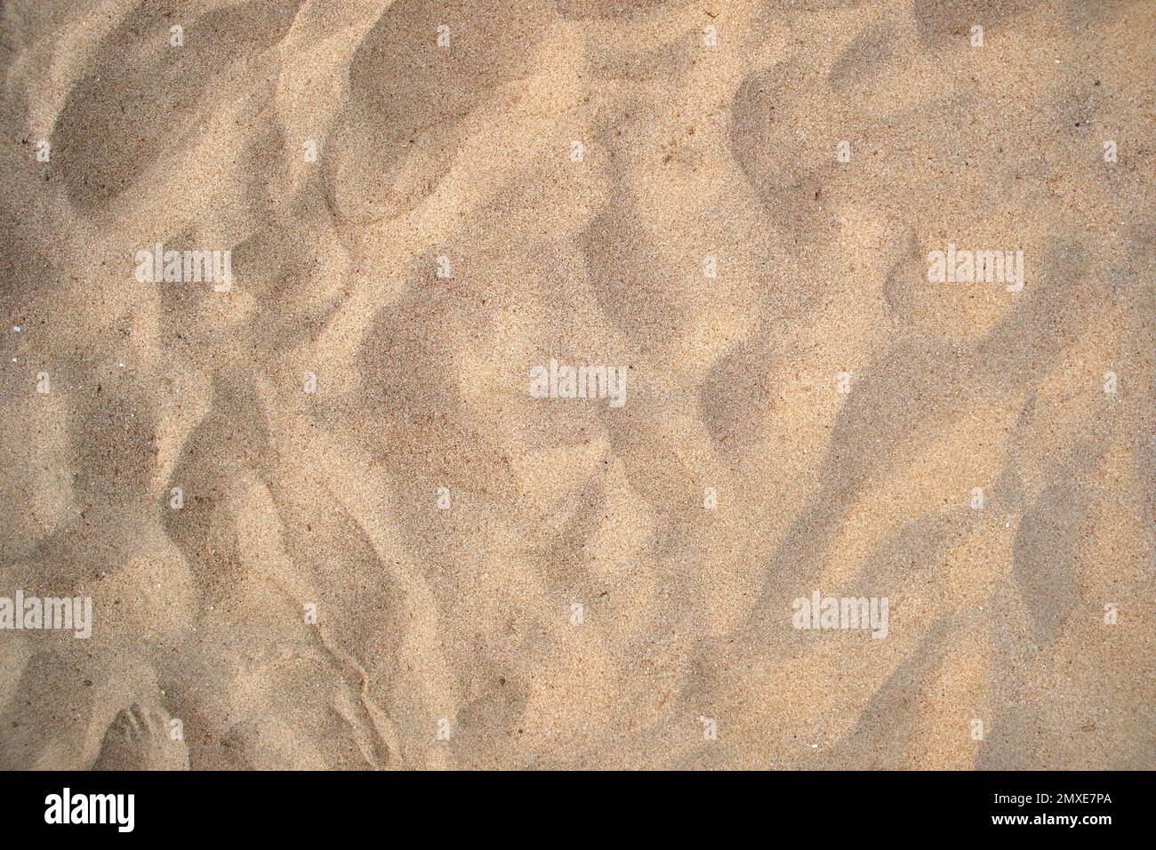 Flat view of clean yellow sand surface covering seaside beach. Sandy ...