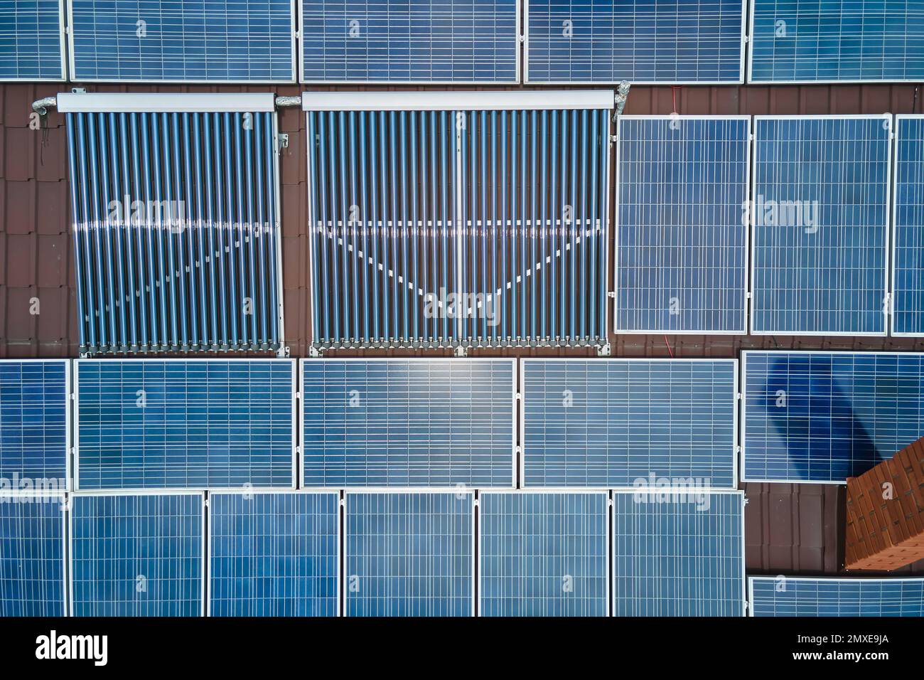 Photovoltaic panels and vacuum air solar collectors for water heating ...