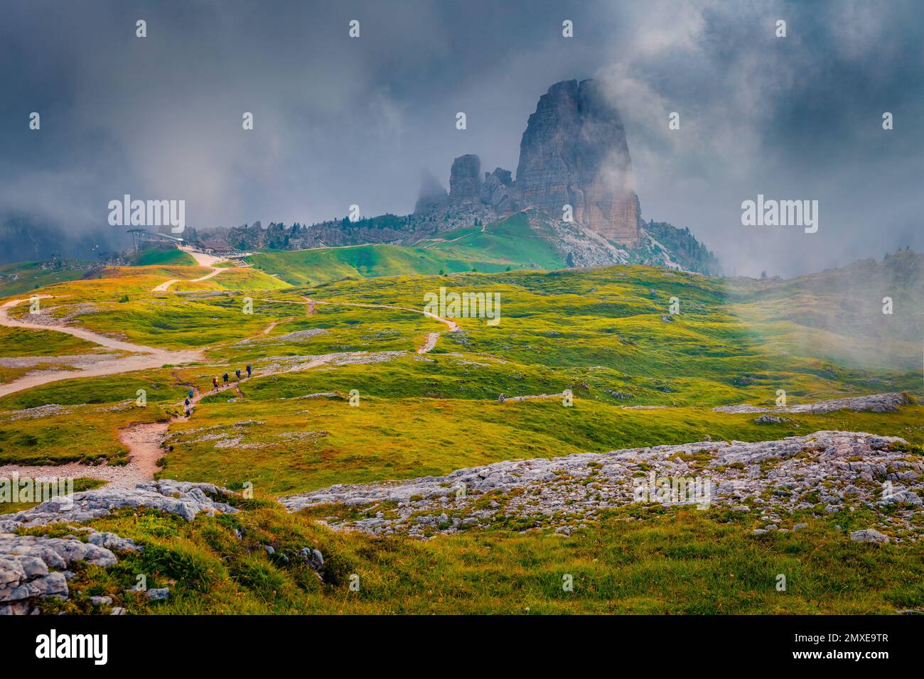 Trekking on Cinque Torri mountain range. Splendid summer scene of ...