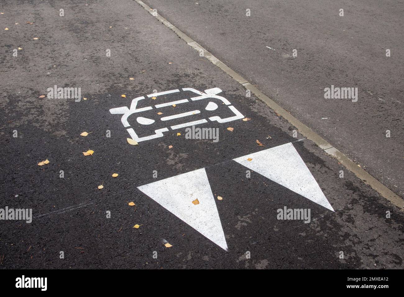 Horizontal white warning signs for bicycles, pedestrians and vehicles ...