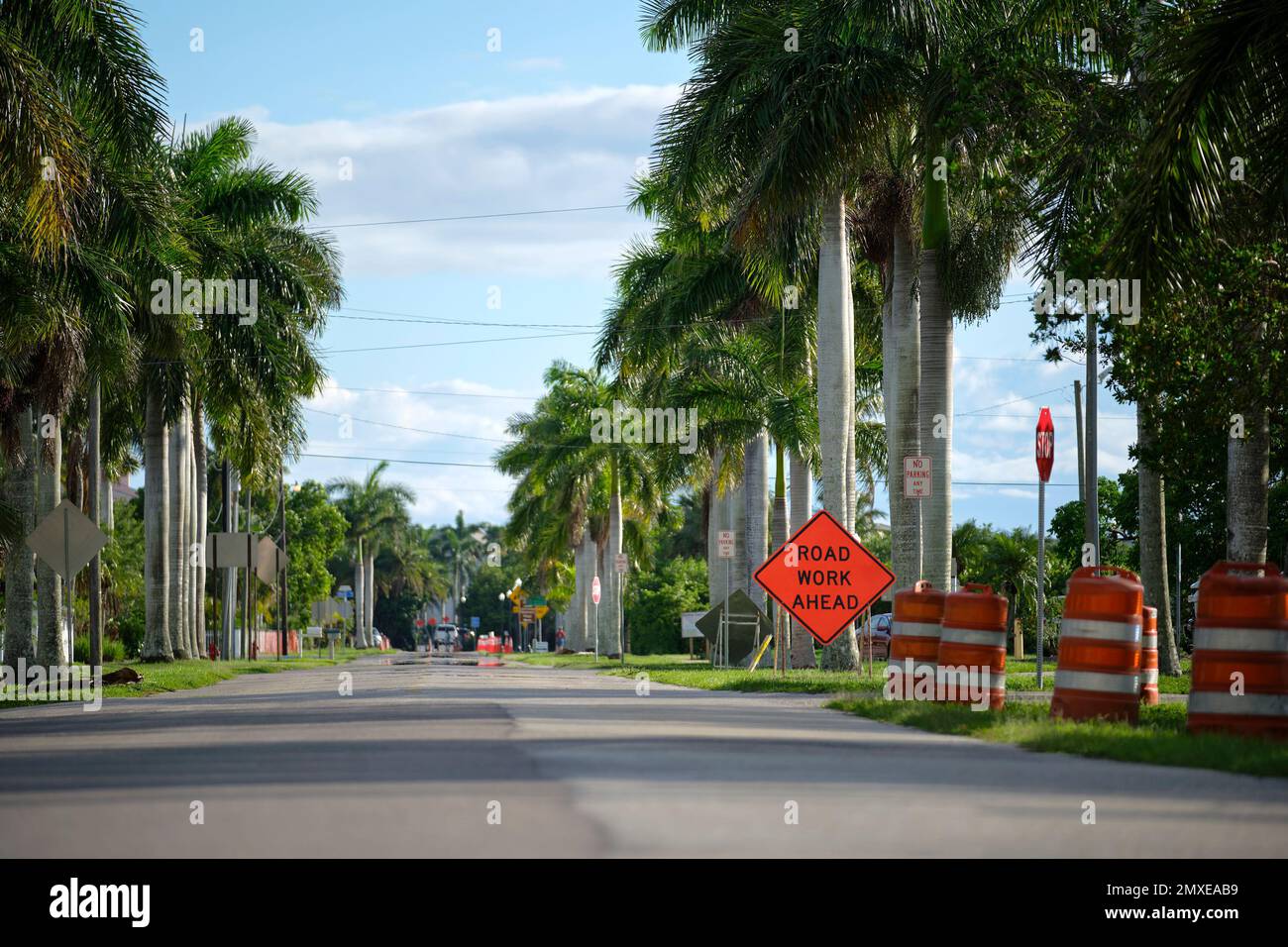 Road work ahead sign on street site as warning to cars about ...