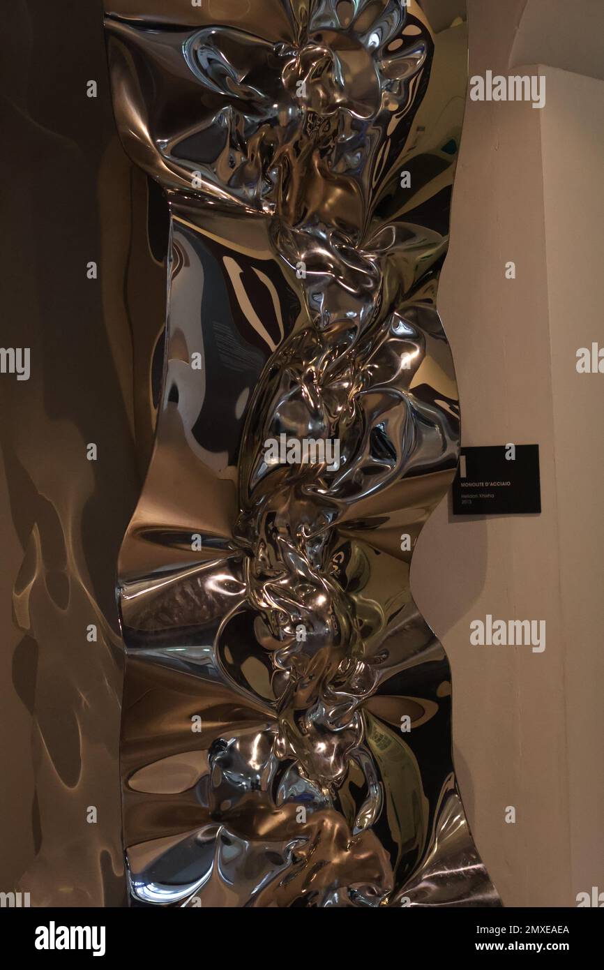 a shiny metal art piece in a museum Stock Photo - Alamy
